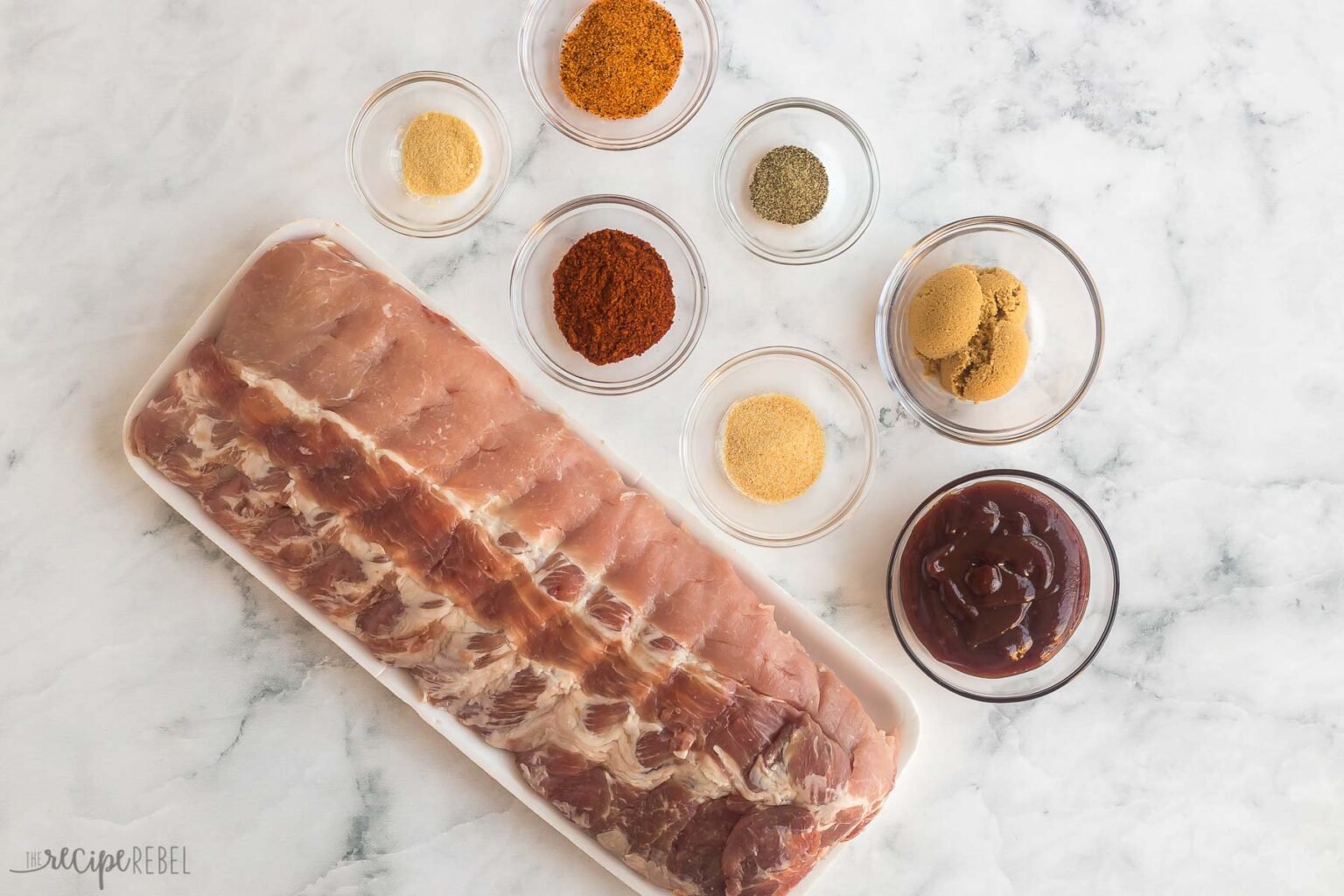 Tender Oven Baked Ribs [VIDEO] - The Recipe Rebel