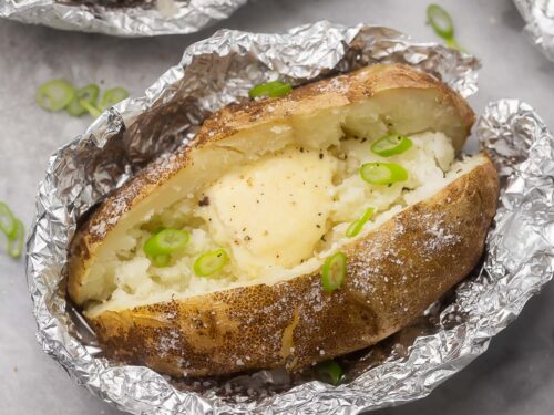 Baked potato on grill store