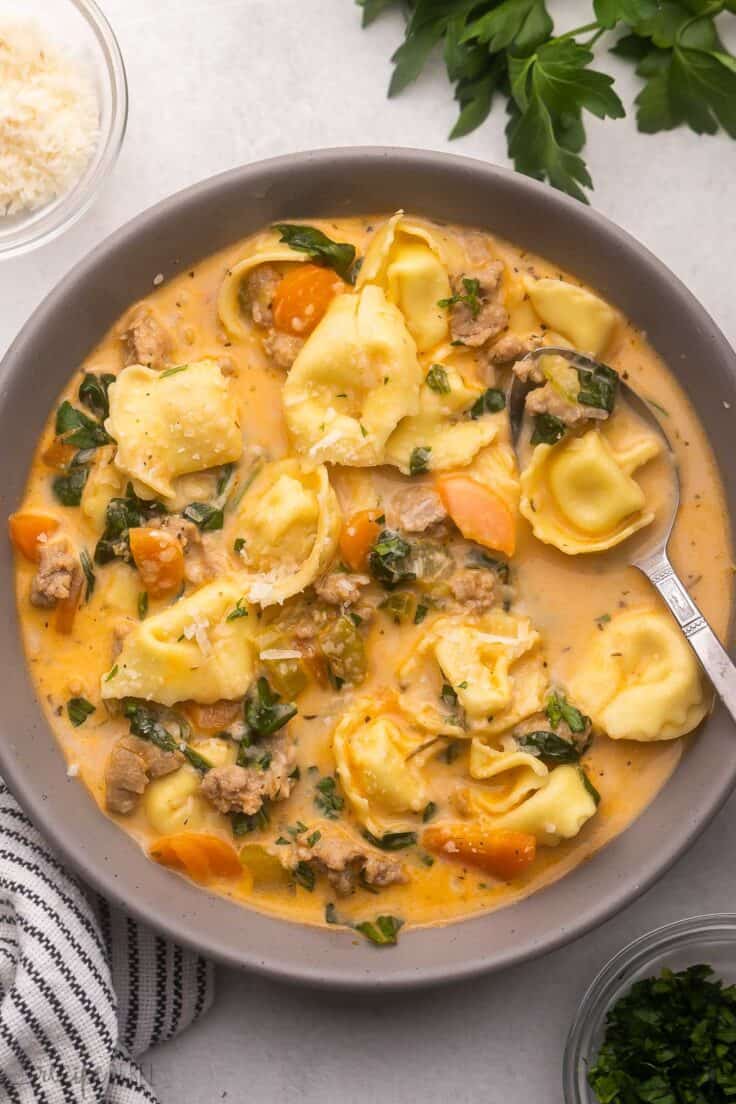 Creamy Crockpot Tortellini Soup - The Recipe Rebel [VIDEO]